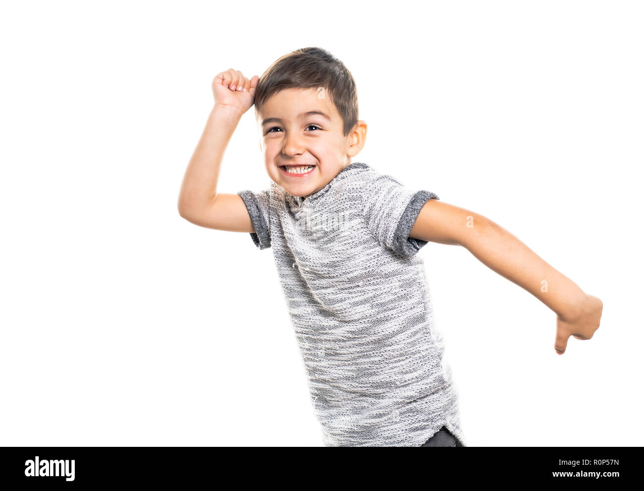 Boy having fun on studio white background Stock Photo - Alamy