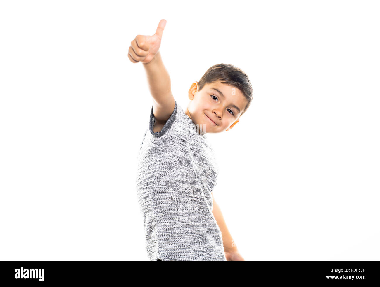 Boy having fun on studio white background Stock Photo - Alamy