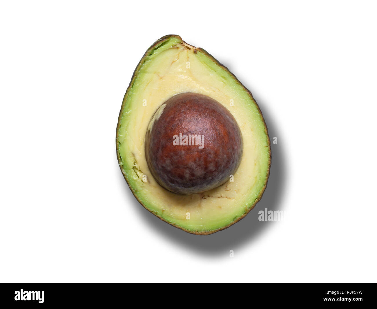 Sliced avocado with core isolated Stock Photo - Alamy