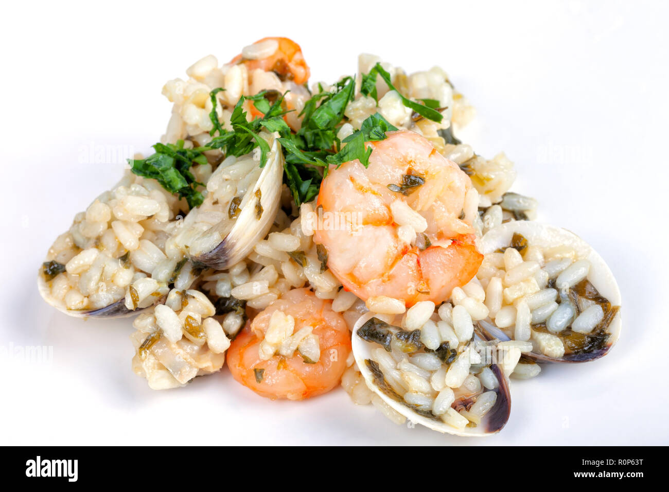Green rice with prawns and clams Stock Photo - Alamy