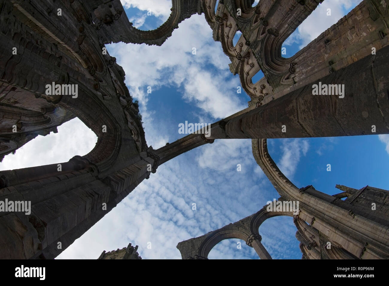 Wide angle shots from underneath the tall gothic arches in the interior ...