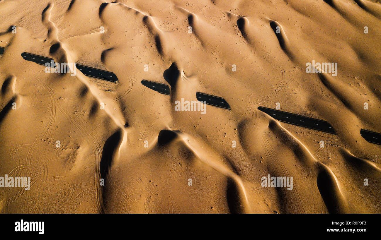 Dubai half desert road Stock Photo - Alamy
