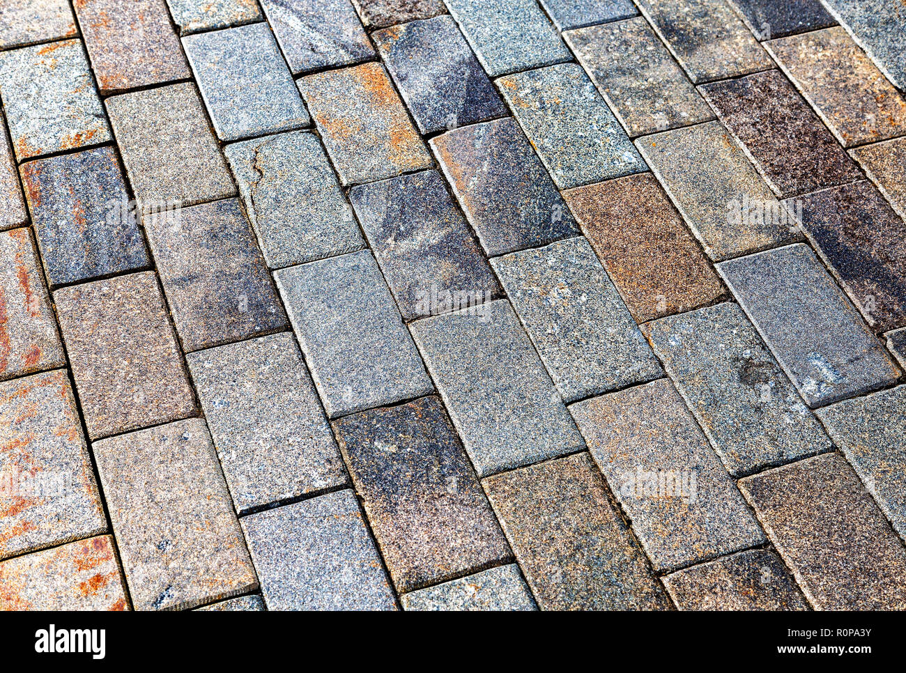 Grey paving stones as background texture closeup Stock Photo - Alamy