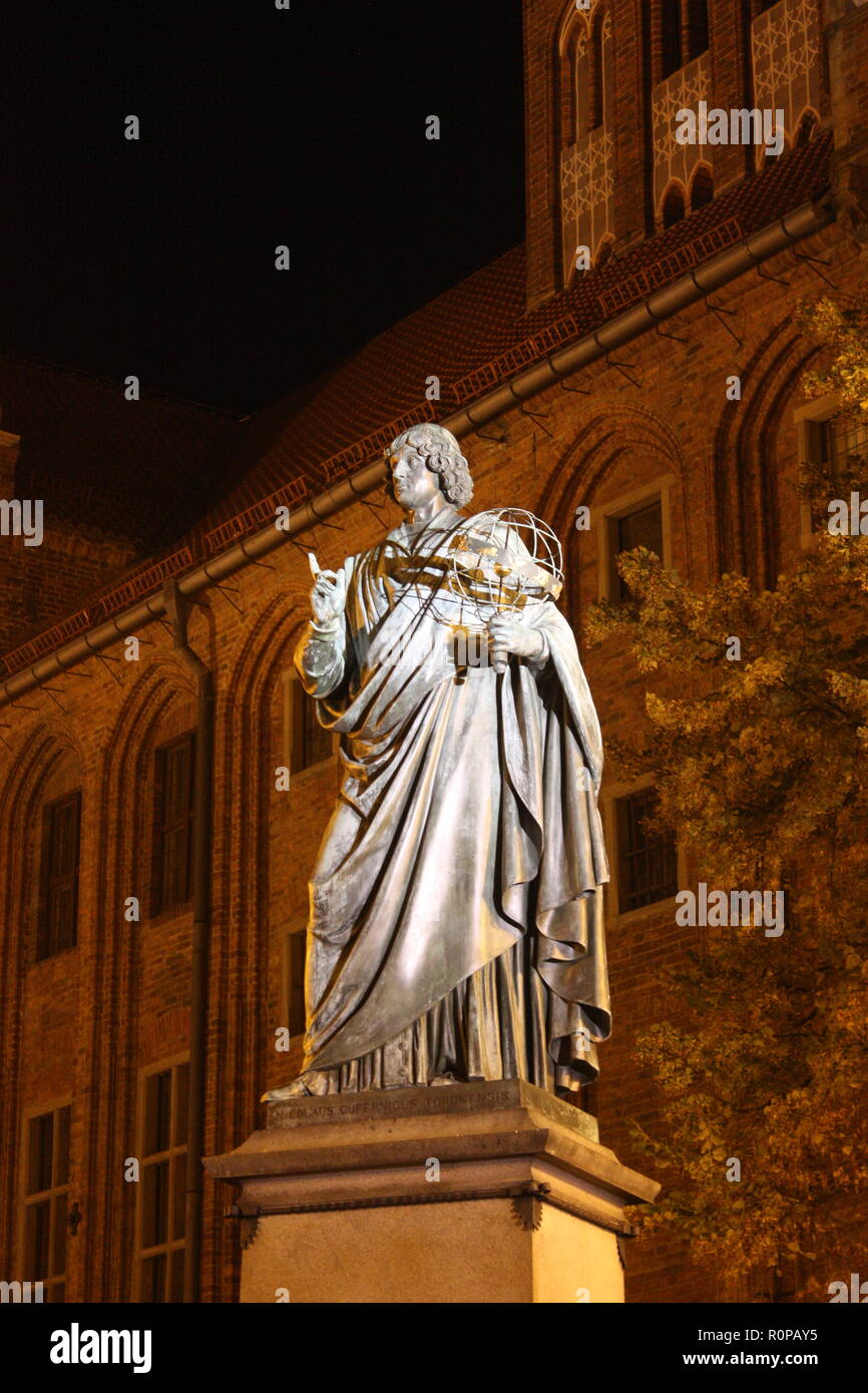 The statue of Nicholas Copernicus in front of the Old Town Hall in ...