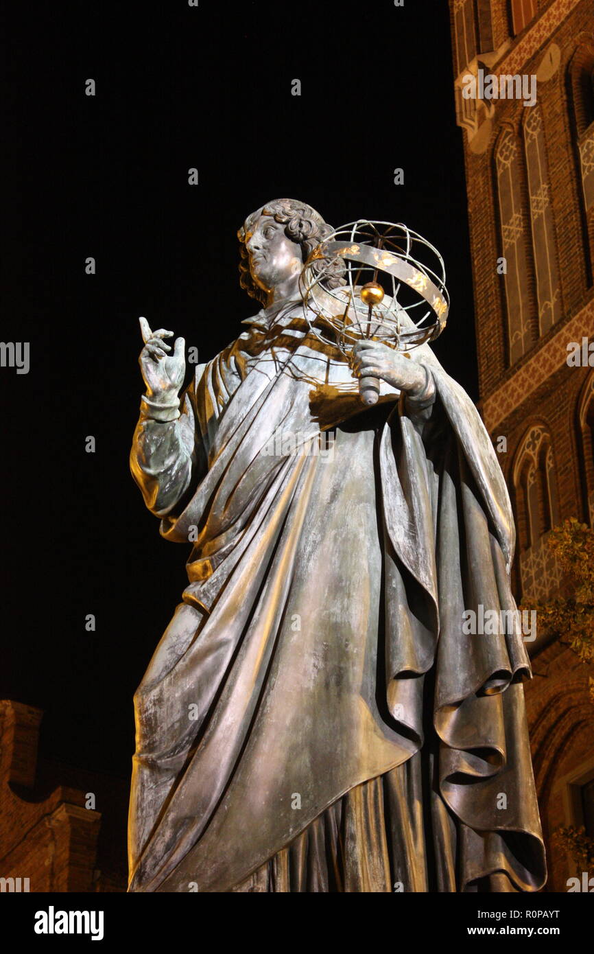 The statue of Nicholas Copernicus in front of the Old Town Hall in ...