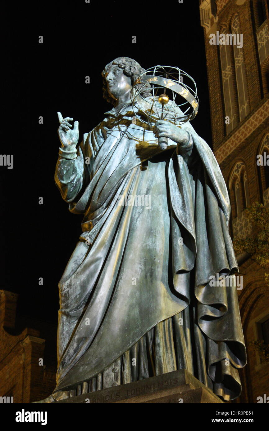 The statue of Nicholas Copernicus in front of the Old Town Hall in ...