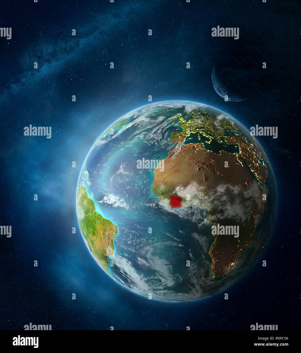Ivory Coast from space on Earth surrounded by space with Moon and Milky ...