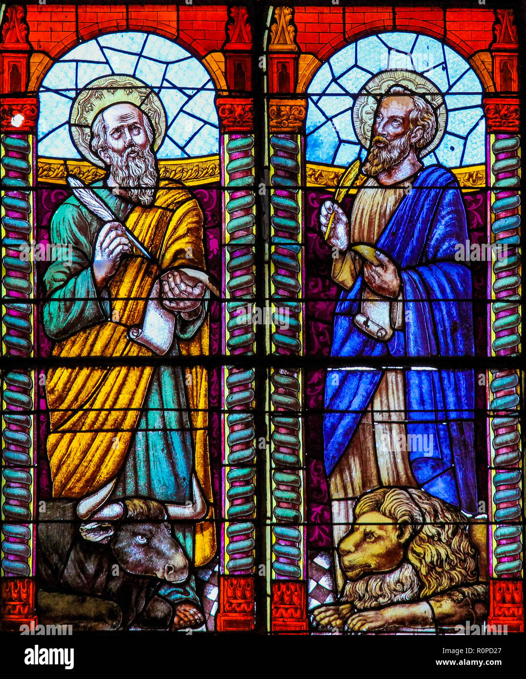 Stained glass depicting the evangelists Saint Luke and Saint Mark in ...