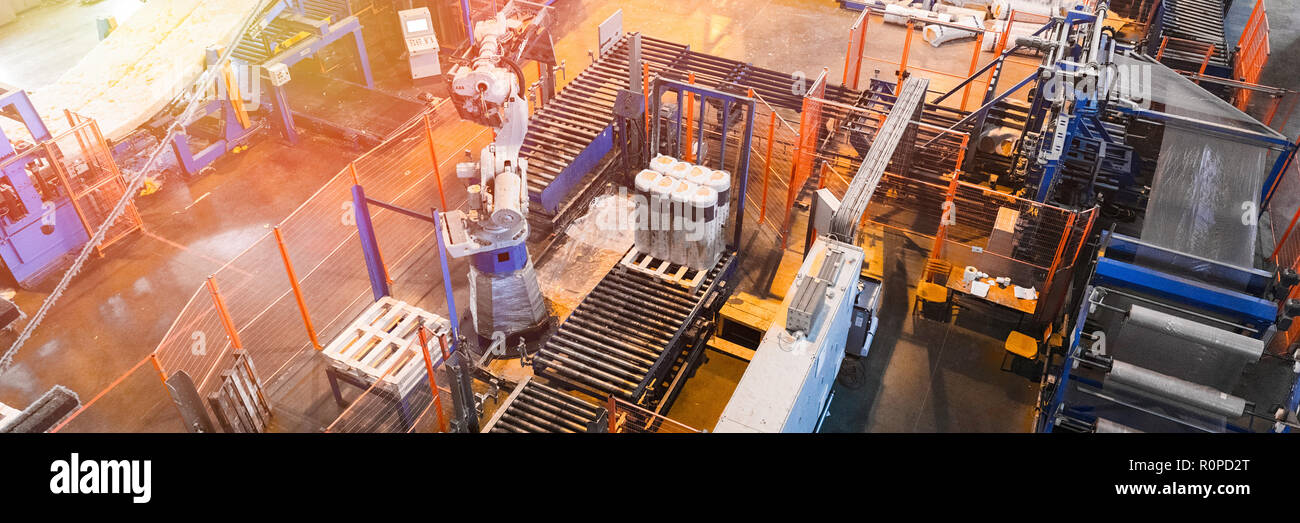 Fiberglass production industry equipment at manufacture background ...