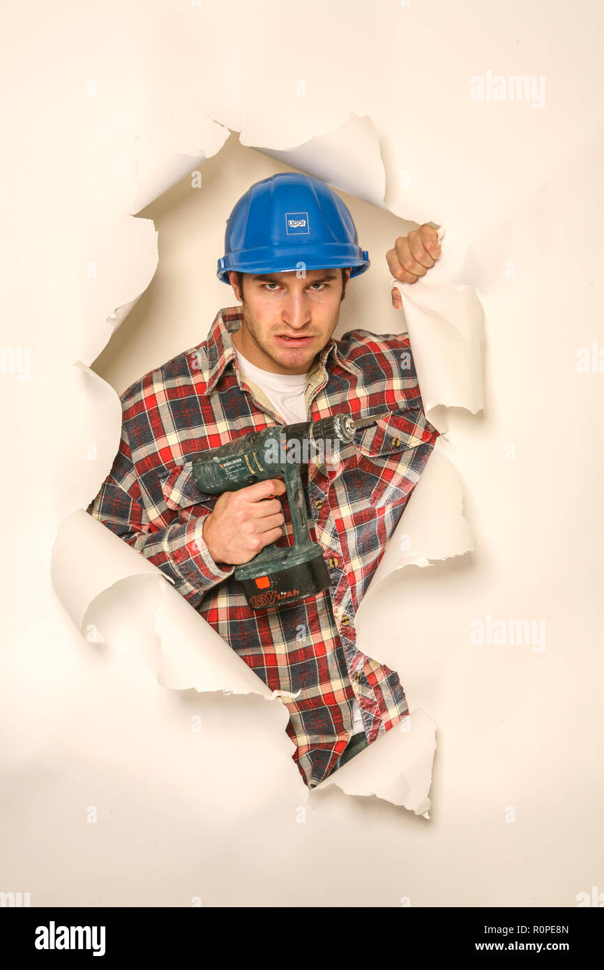 Busting a hole hi-res stock photography and images - Alamy
