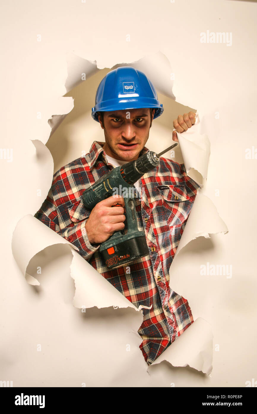 Busting a hole hi-res stock photography and images - Alamy