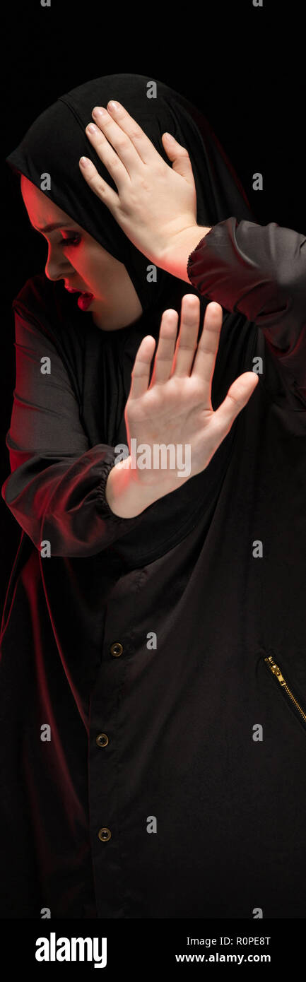 Portrait of beautiful desperate scared frightened young muslim woman ...