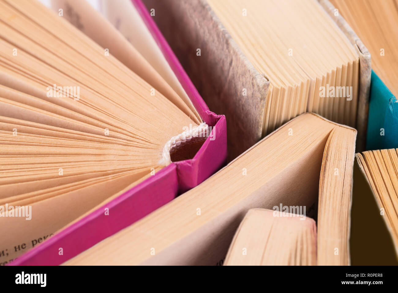 Opened books close up picture Stock Photo - Alamy