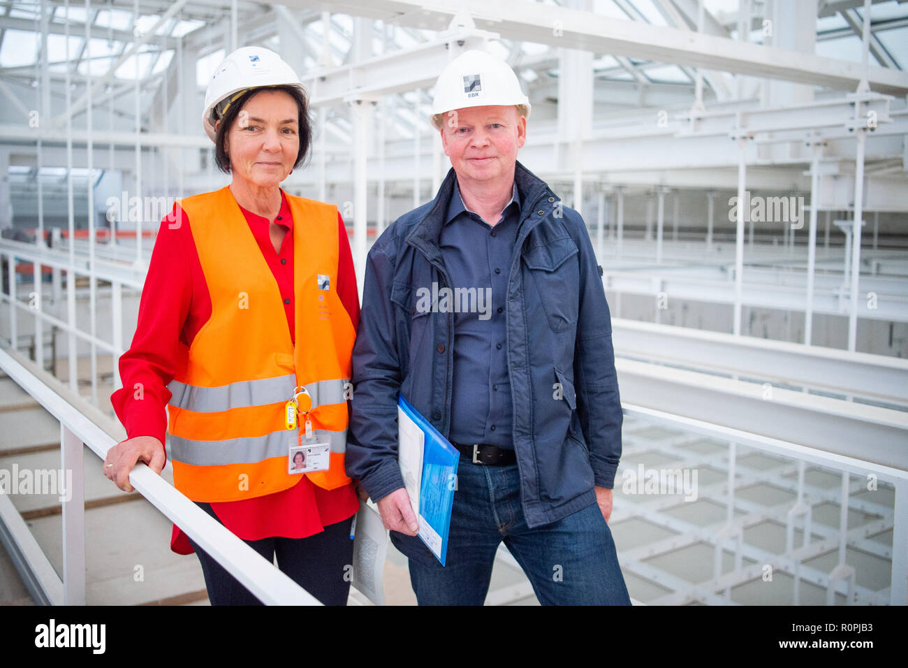 25 October 2018, Berlin: Frank Röger (r), overall project manager for ...