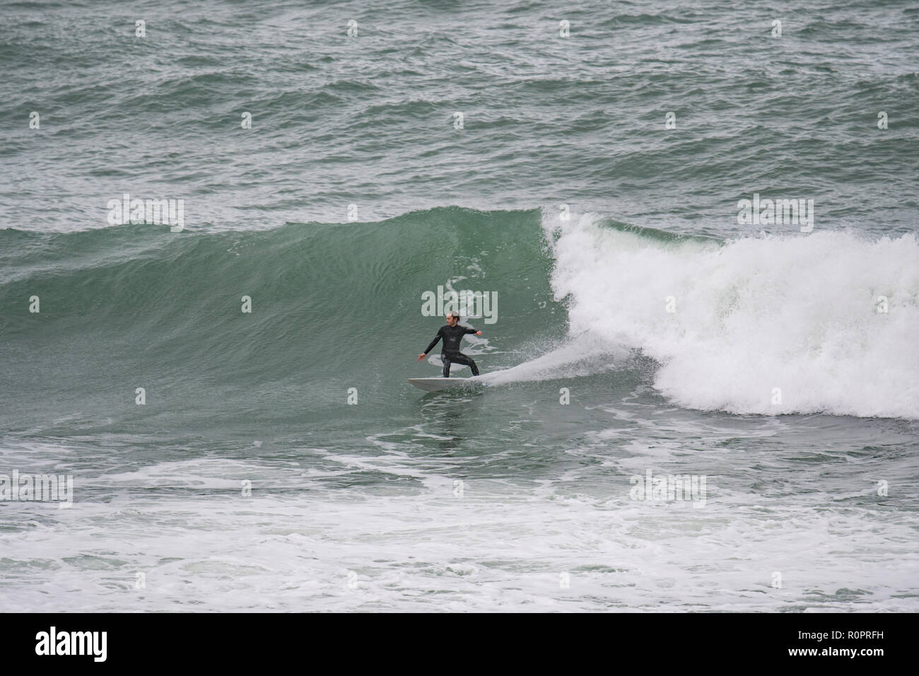 Ideal couple early morning surfers hi-res stock photography and images ...
