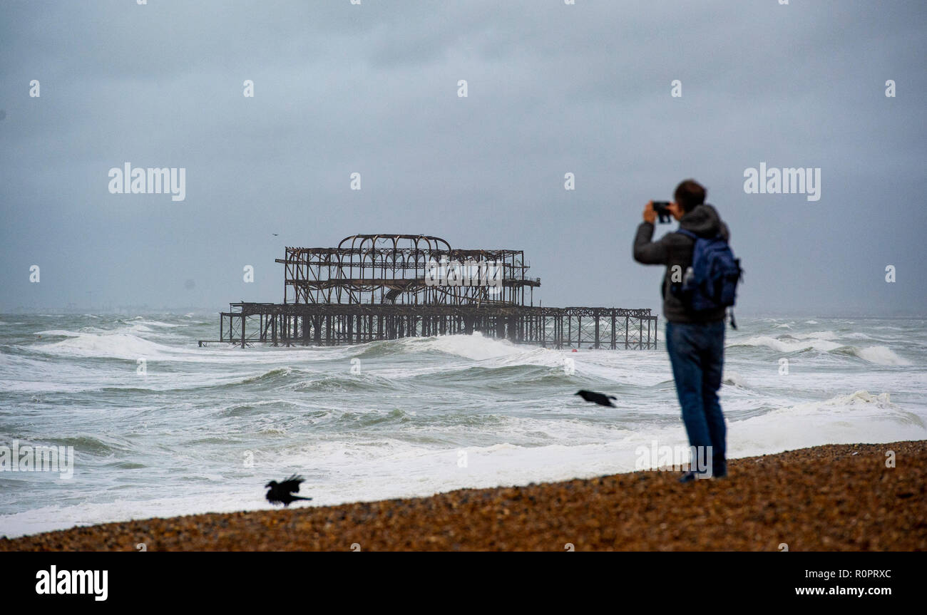 Waves crash on the seafront near brighton pier in brighton hi-res stock ...