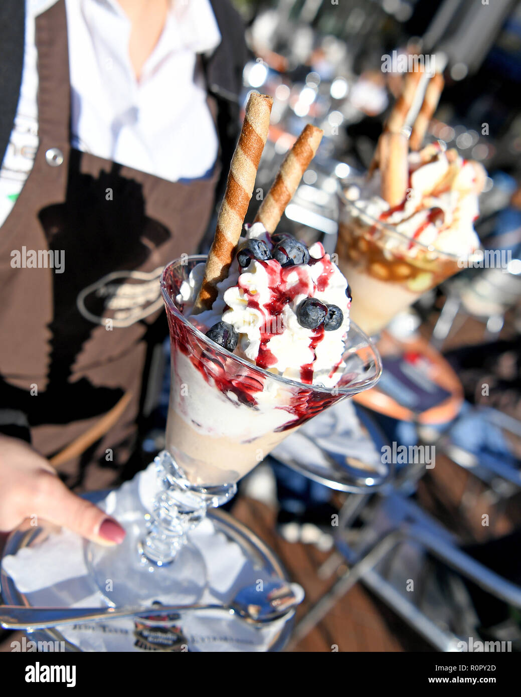 Hannover, Germany. 07th Nov, 2018. Anna serves ice-cream sundaes on the ...