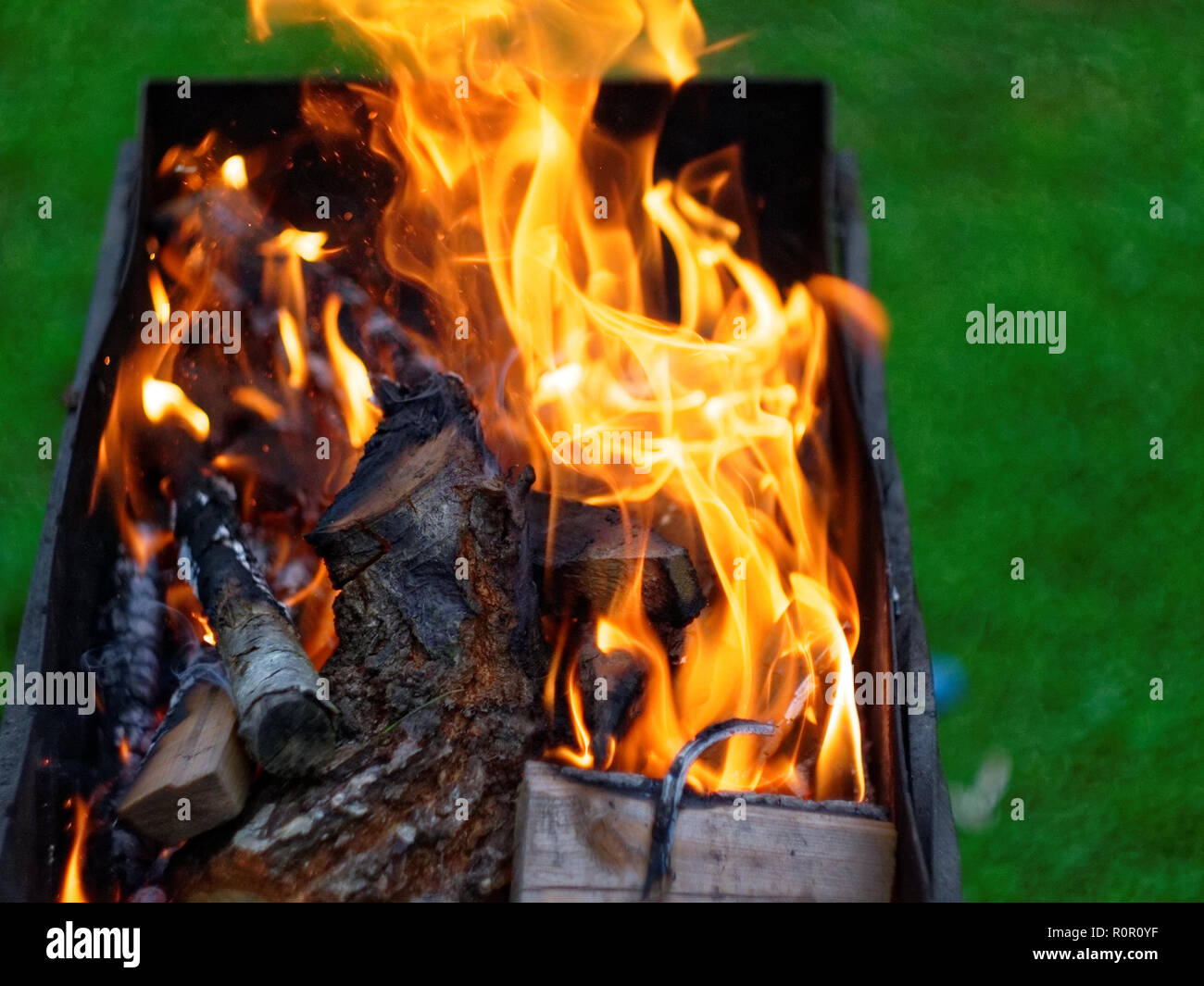 fire burns on wood in the grill, Russia Stock Photo - Alamy