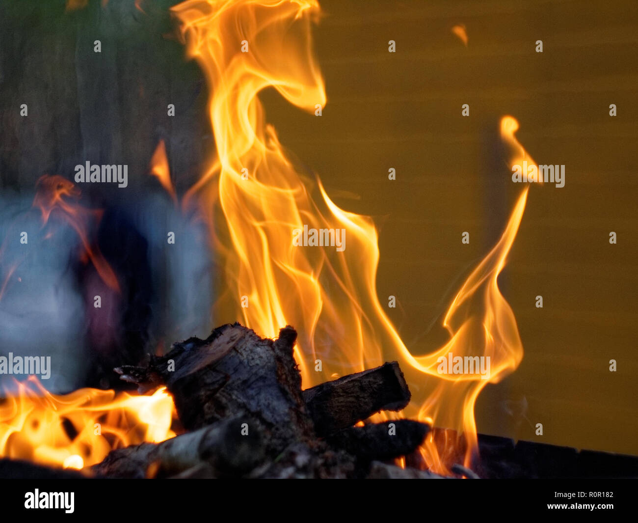 Orange fire burns in grill hi-res stock photography and images - Alamy
