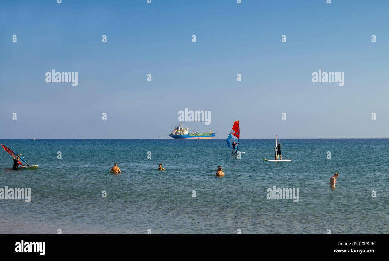 Surfboarders and swimmers at Prasonisi Beach, Rhodes Greece. The beach ...