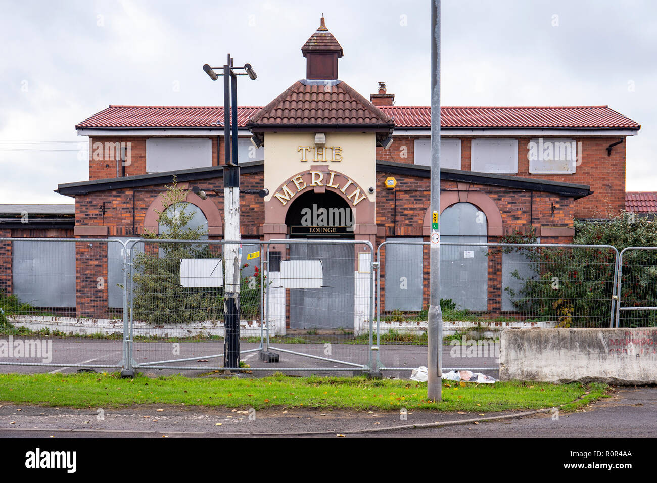 The closed down and boarded up Merlin pub, now a super market, in Crewe ...