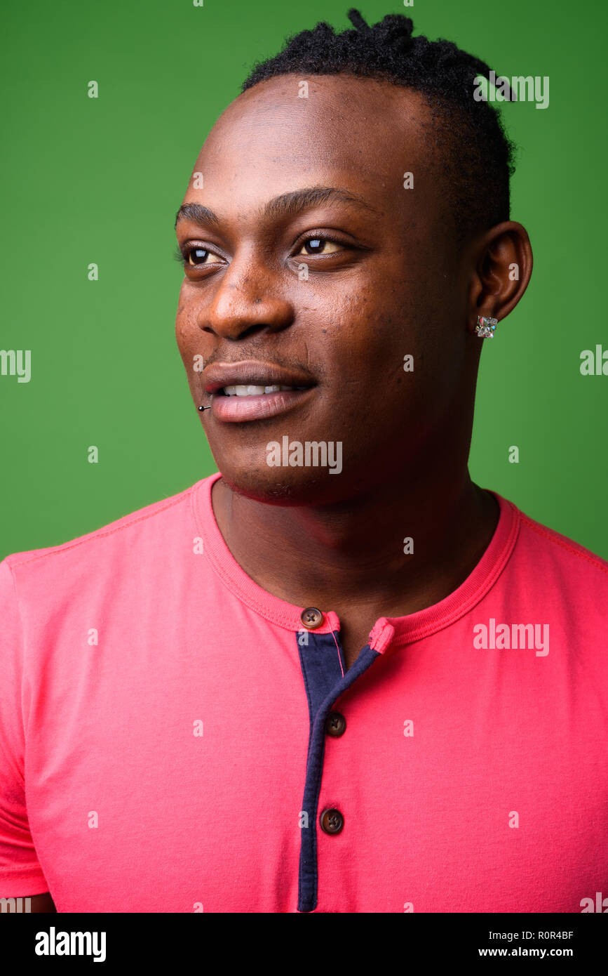 Young handsome African man from Kenya against green background Stock ...