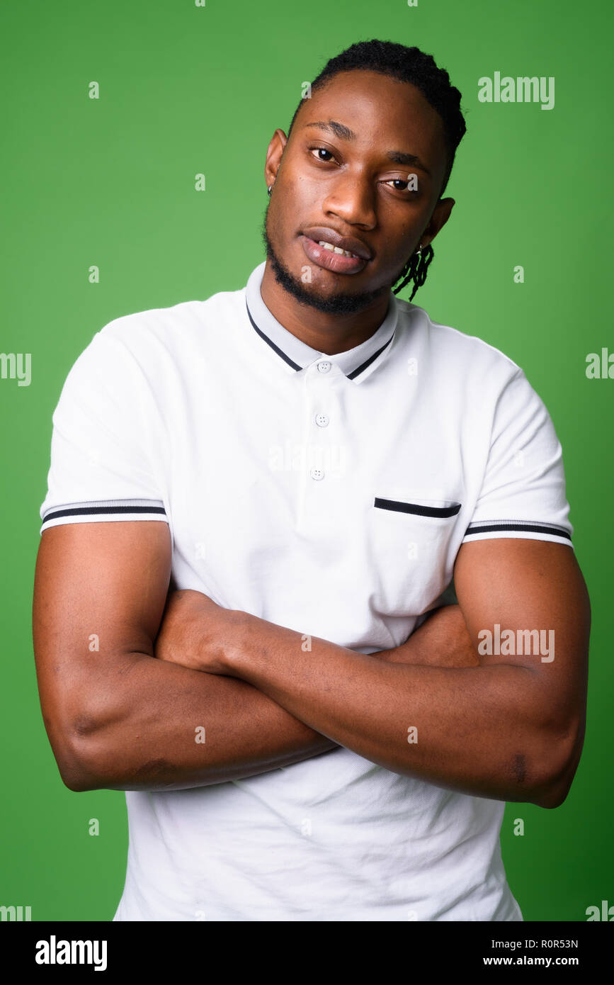 Young handsome African man from Kenya against green background Stock ...