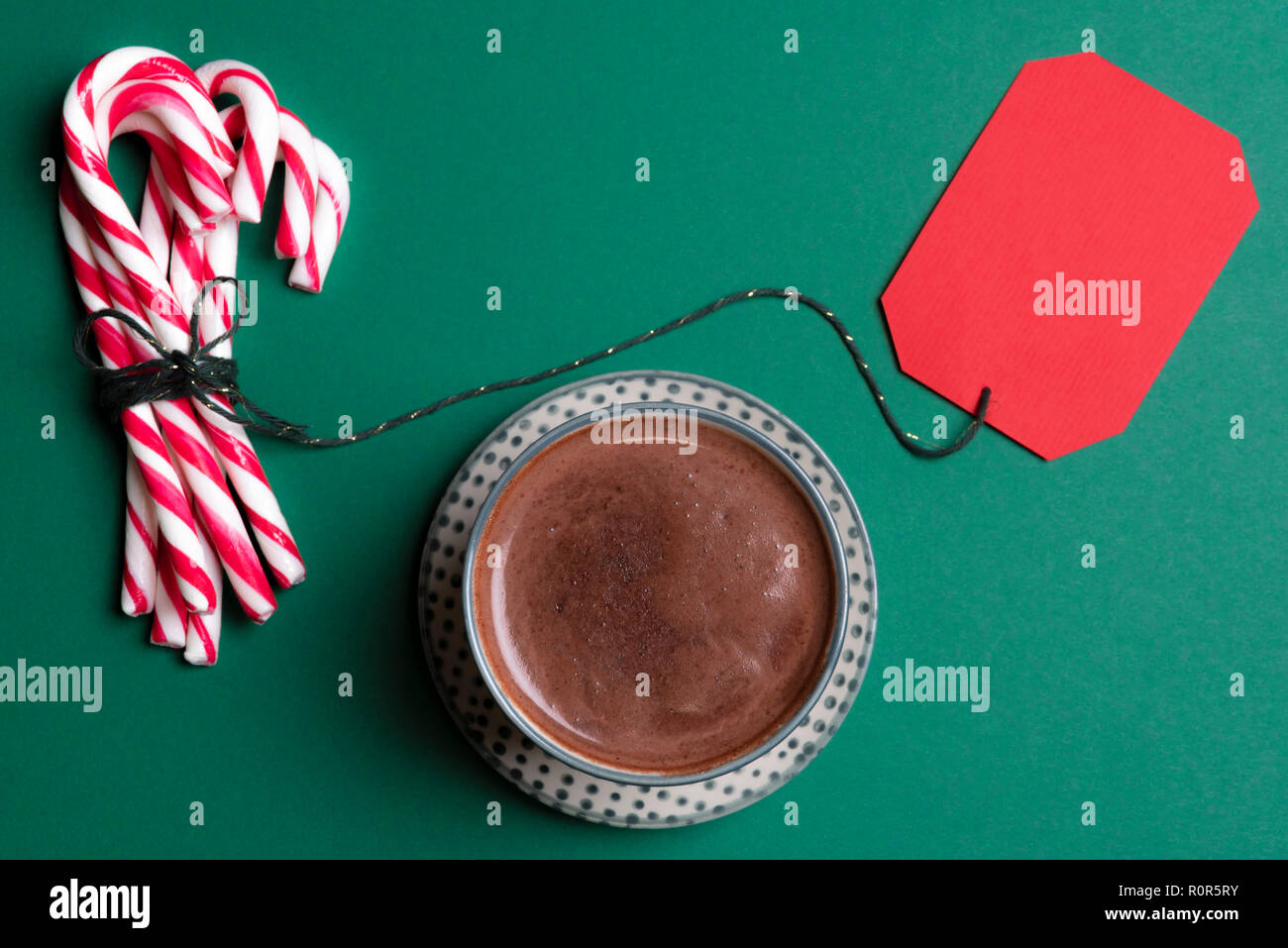 Bouquet of candy canes, with red and white stripes, tied to an empty ...