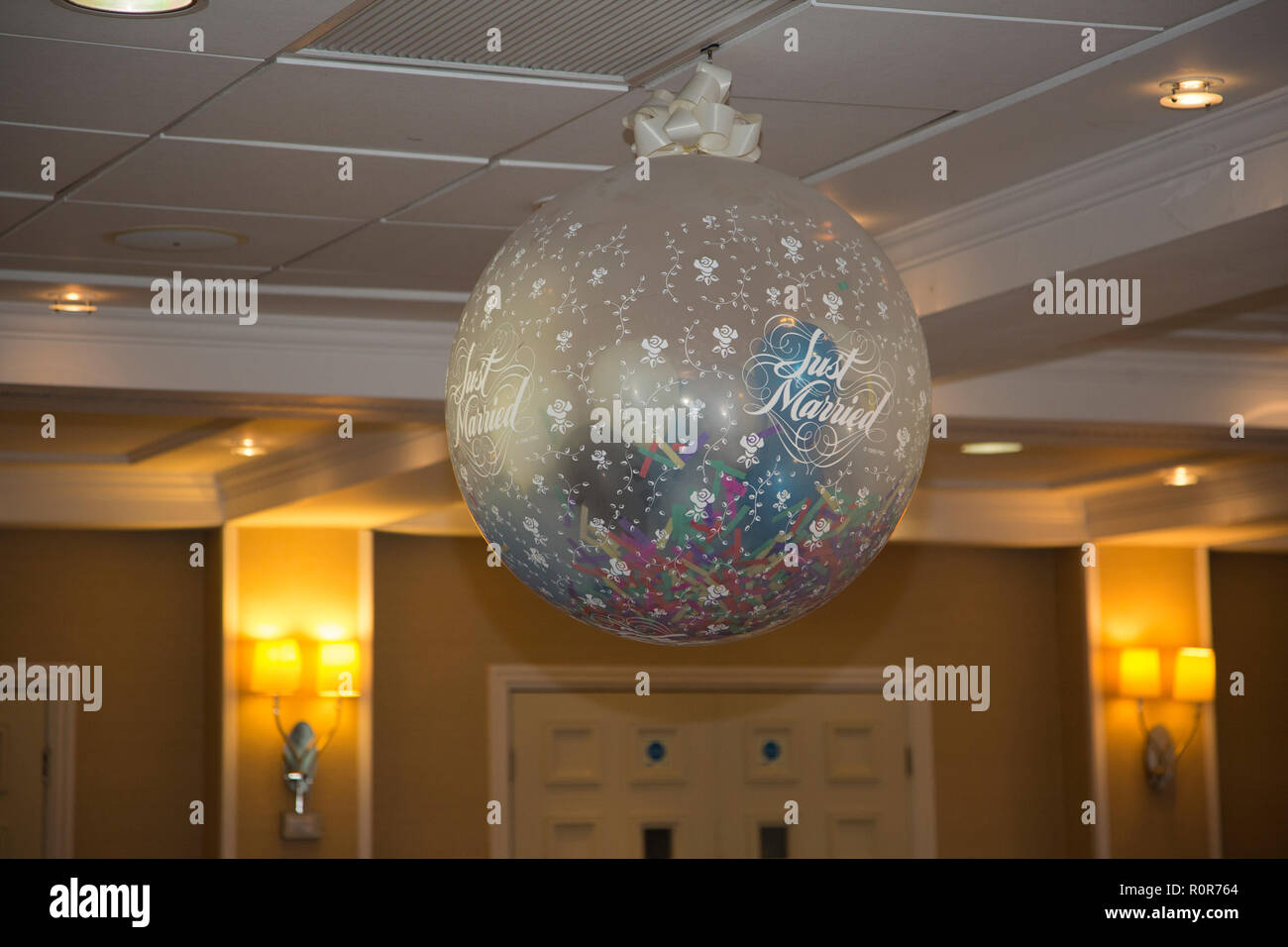 First Dance balloon full of confetti ready for the bride and groom to ...