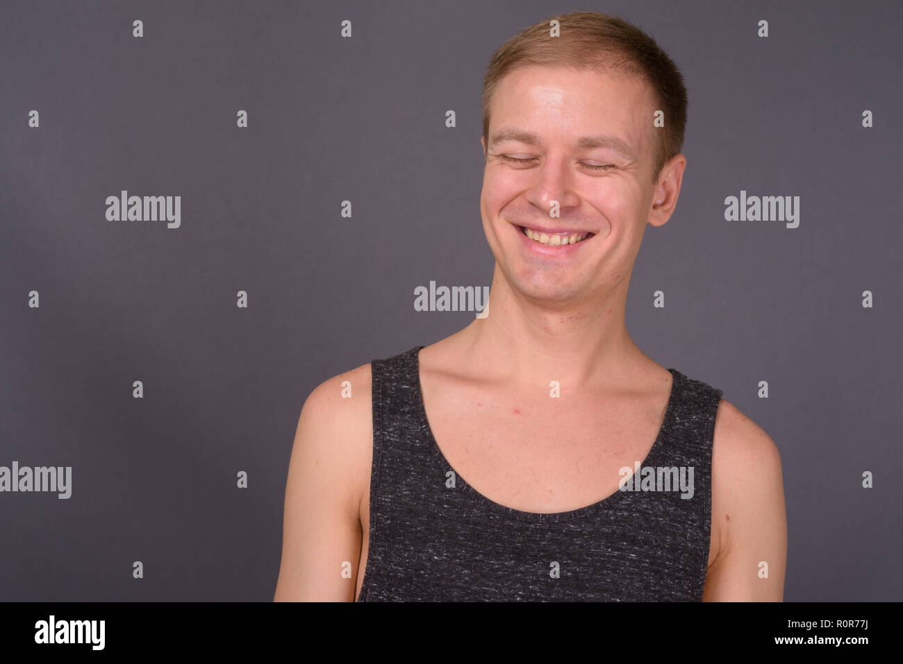 Portrait man smiling tank hi-res stock photography and images - Alamy