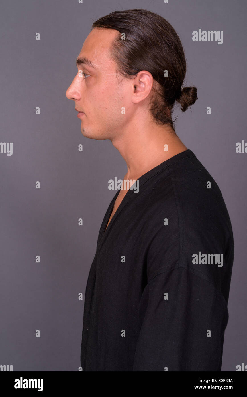 Side view handsome young hi-res stock photography and images - Alamy