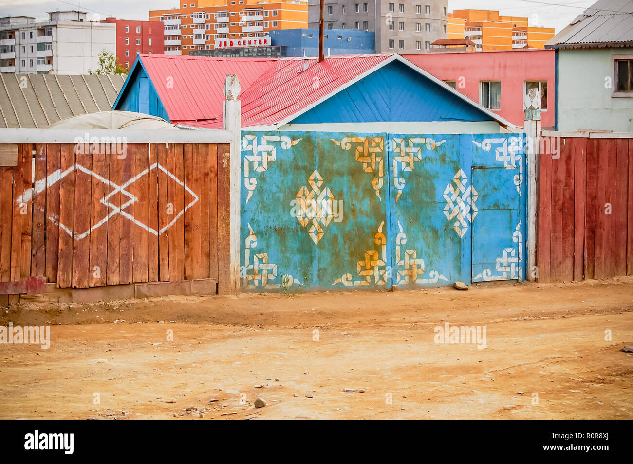 Ulaanbaatar, Mongolia - July 9, 2010: Typical dirt side street with ...