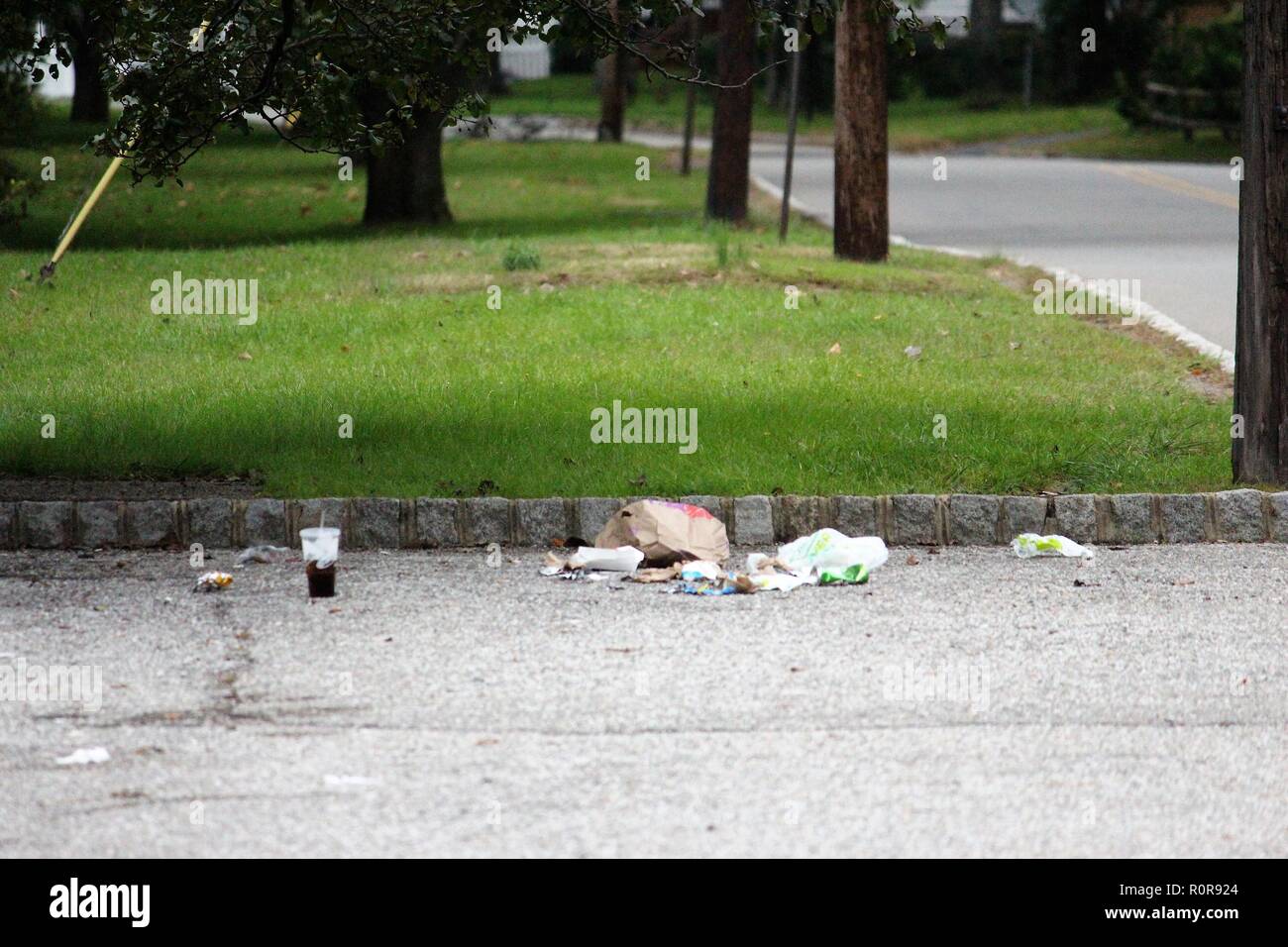 food and drink items left next to the road curb Stock Photo - Alamy