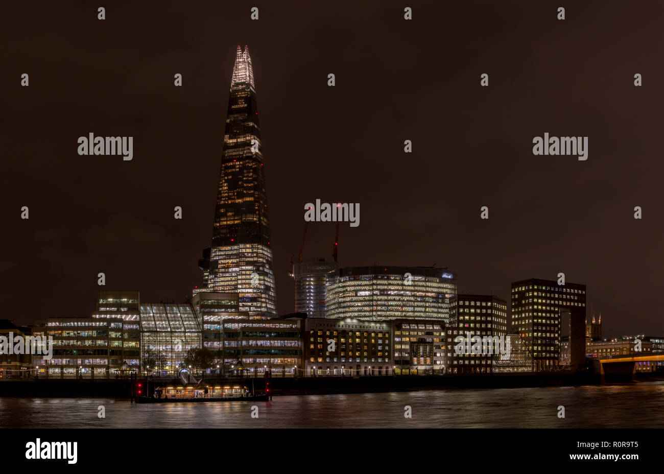 Night photograph of the London skyline, including the Shard, at night ...