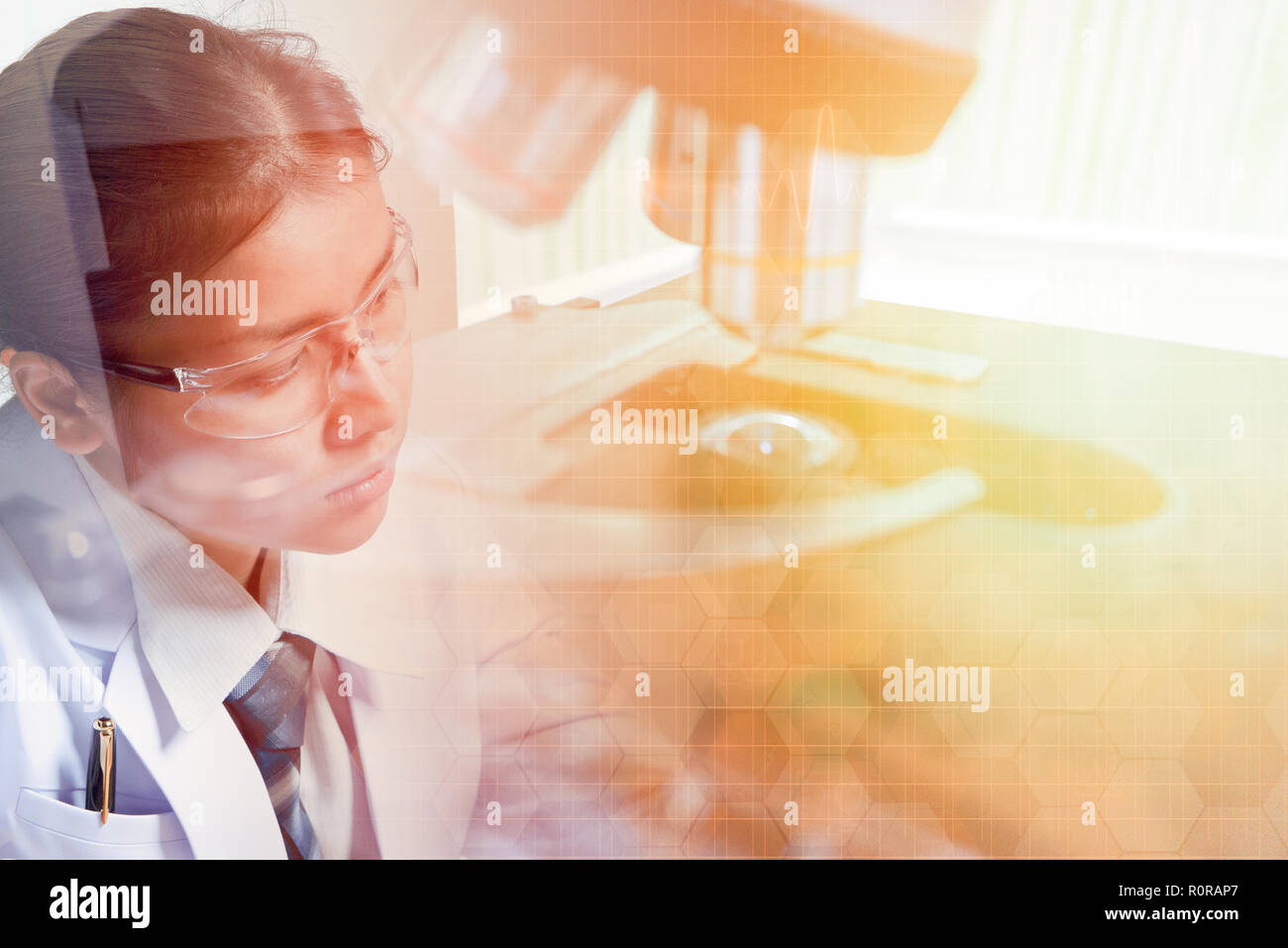 double exposure of young doctor and microscope, medical technology ...