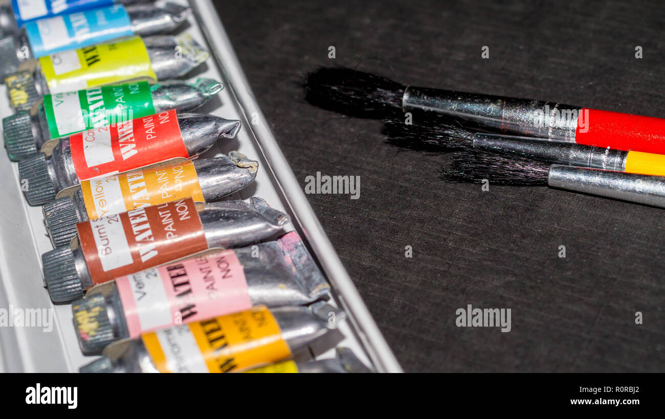 water paint set in the box with different size of paintbrushes. art ...