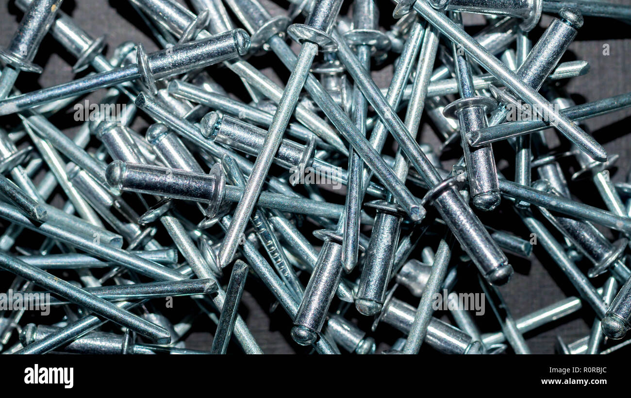 metal blind rived. construction and industrial background Stock Photo ...