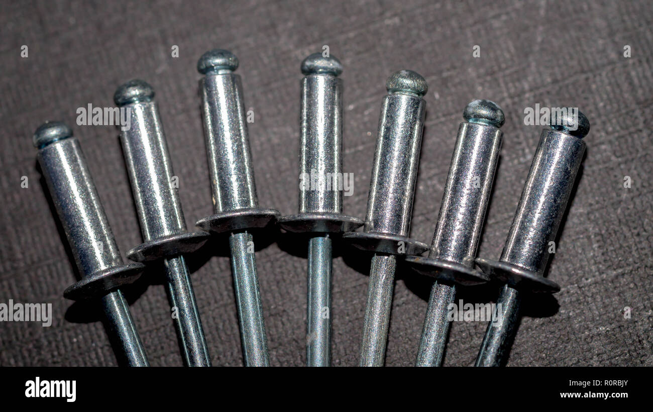 metal blind rived. construction and industrial background Stock Photo ...