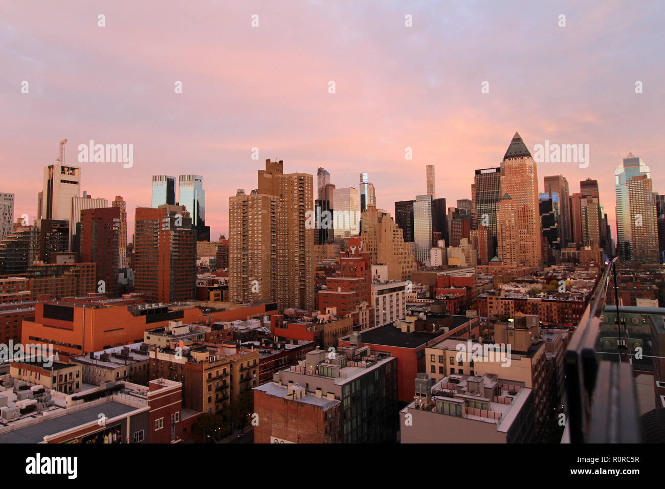 New York City skyline as viewed from Press Lounge rooftop bar at sunset ...
