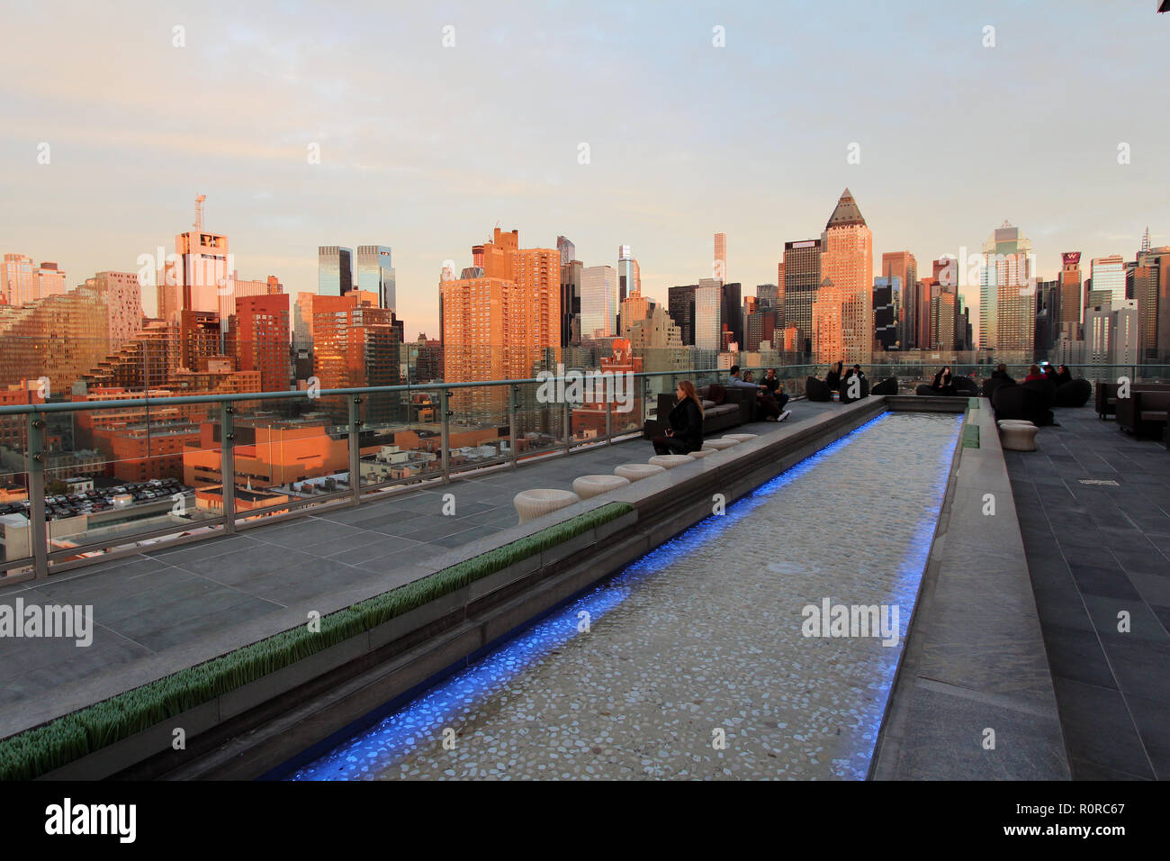 New York City skyline as viewed from Press Lounge rooftop bar at sunset ...
