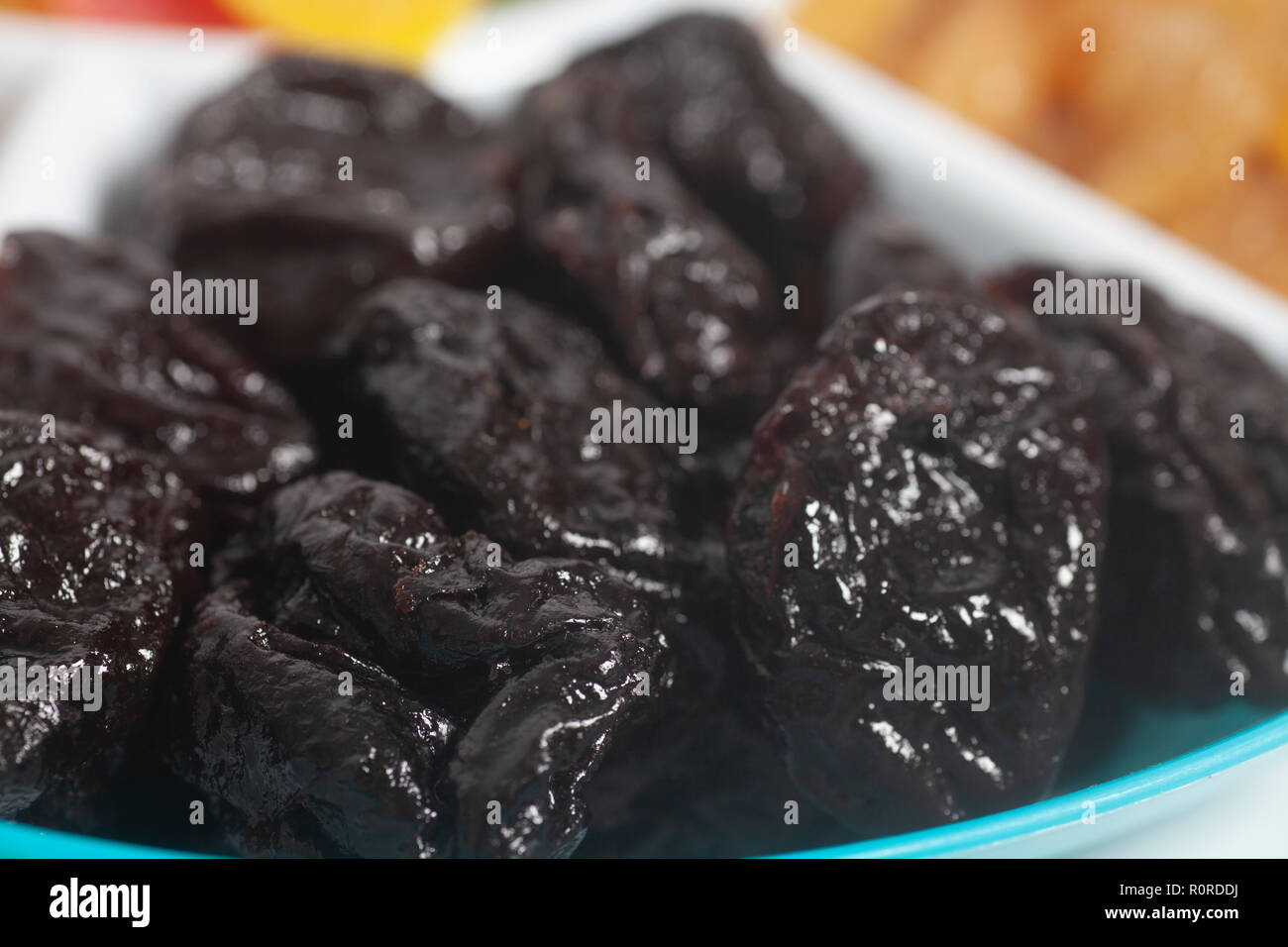 Fruit of dried prunes close up Stock Photo - Alamy