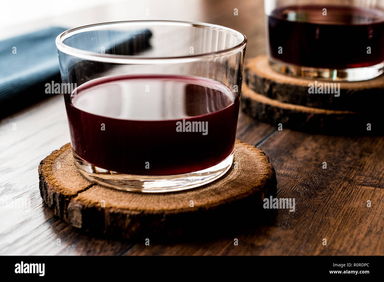 Red wine in short glass. beverage concept Stock Photo - Alamy