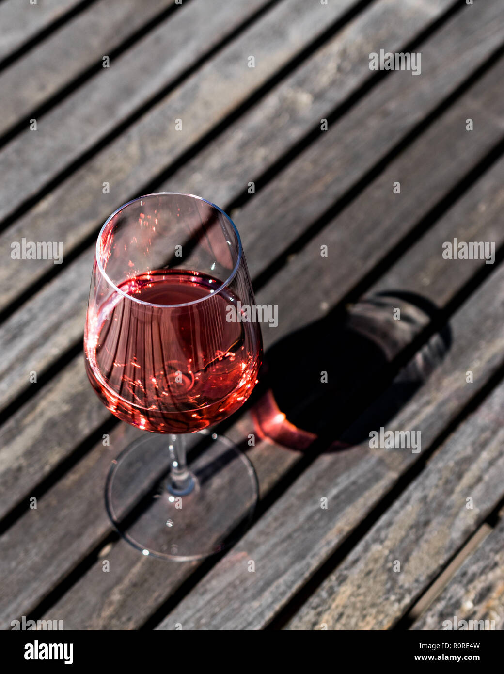 Rose Wine glass at garden (natural light). Beverage Concept Stock Photo ...