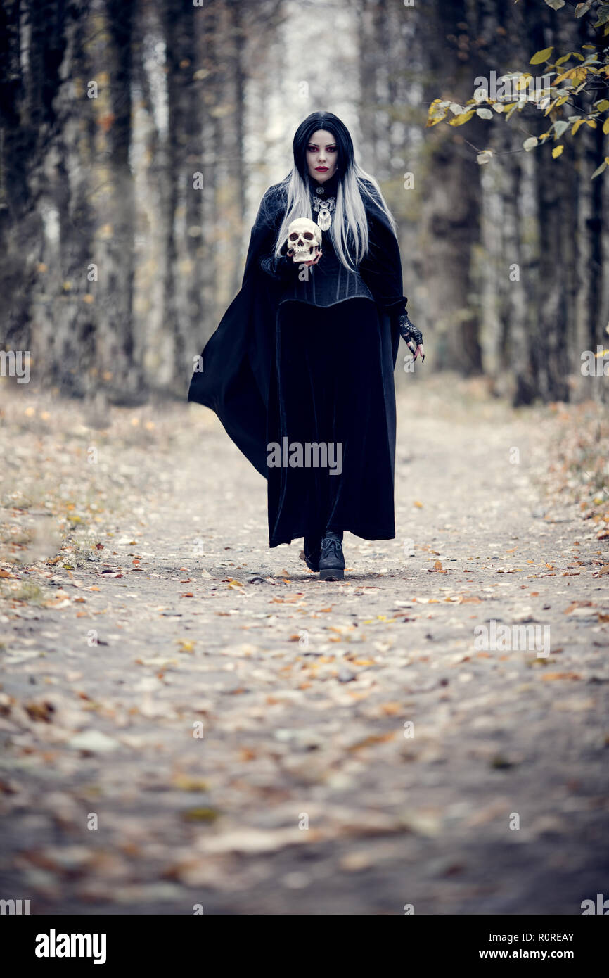 Beautiful vampire woman black cloak hi-res stock photography and images ...