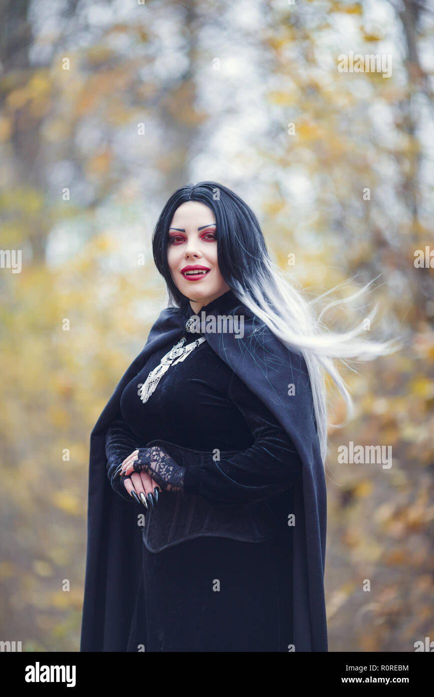 Beautiful vampire woman black cloak hi-res stock photography and images ...