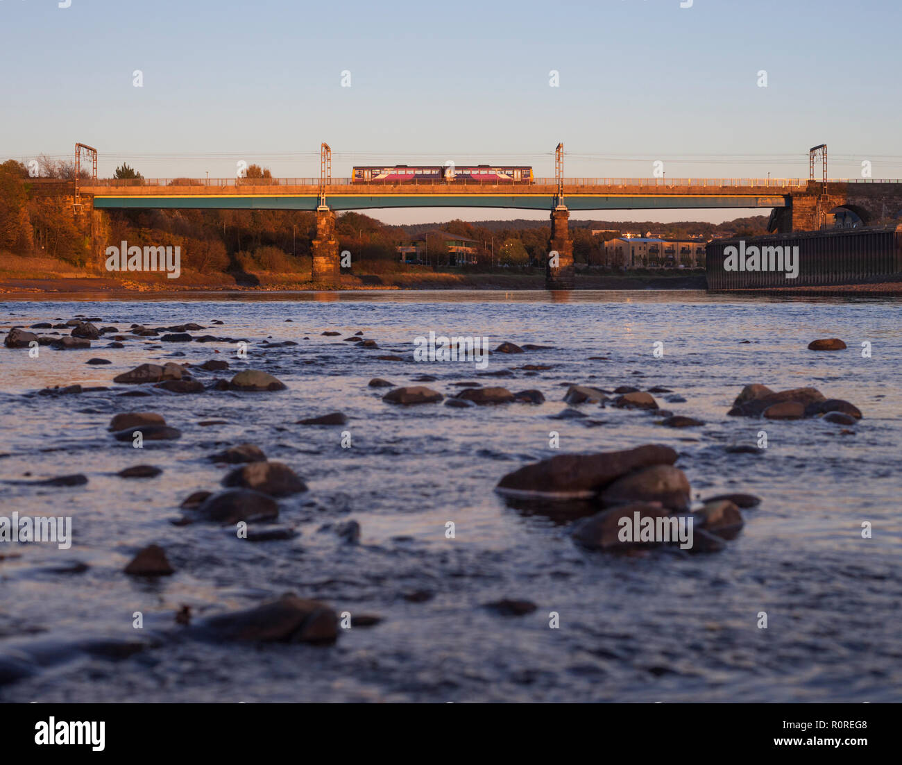 A Arriva Northern Rail class 142 pacer train crosses the viaduct over ...