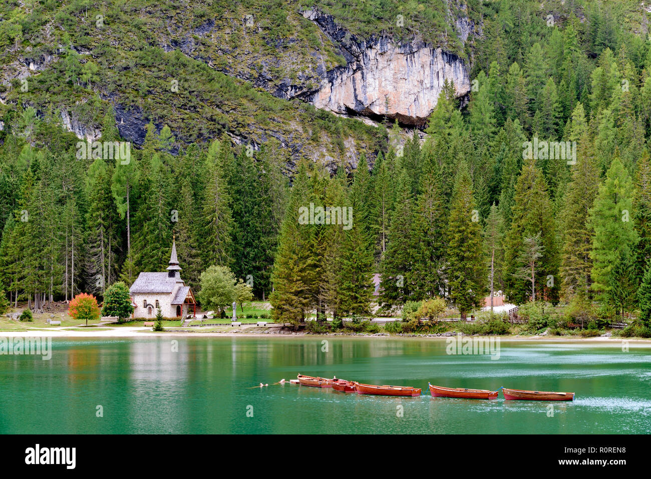 Lake Prags, emerald green mountain lake with rowing boats and the Lake ...