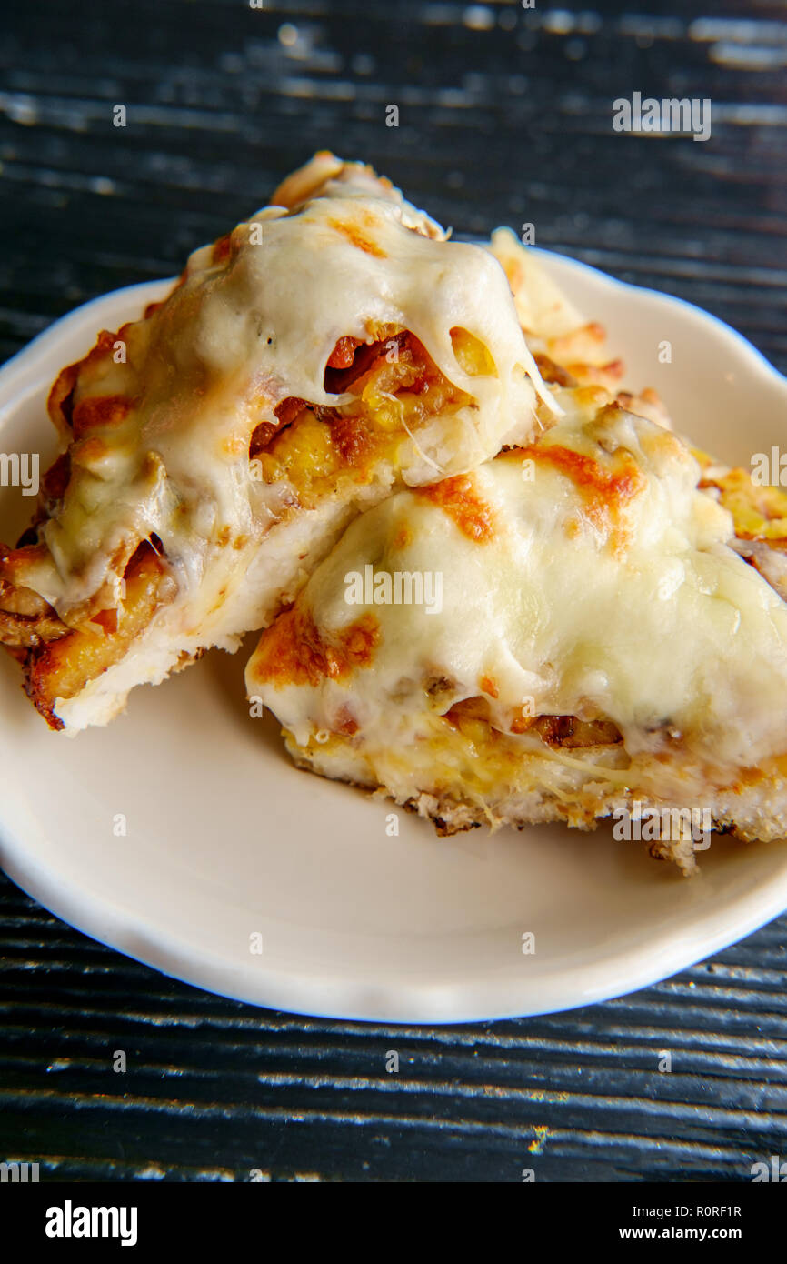 Colombian cuisine loaded grilled cheese arepas with bacon Stock Photo ...