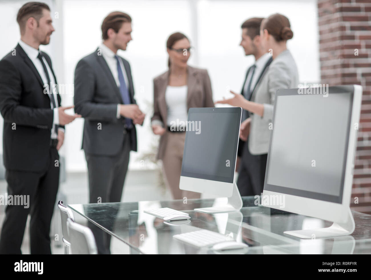 businessman explaining his ideas to his colleagues Stock Photo - Alamy