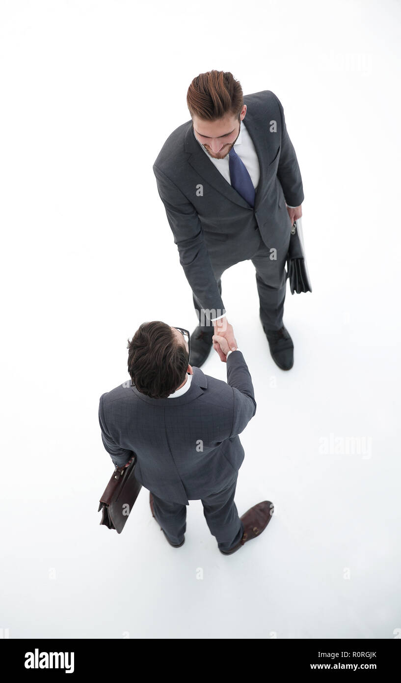 top view.the handshake business partners Stock Photo - Alamy